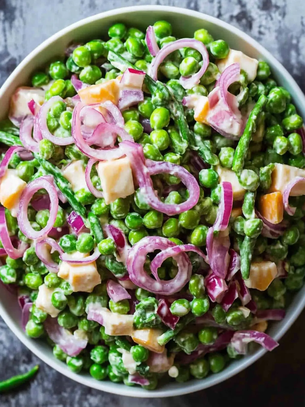 Irresistible Pea Salad with Red Onions and Cheese